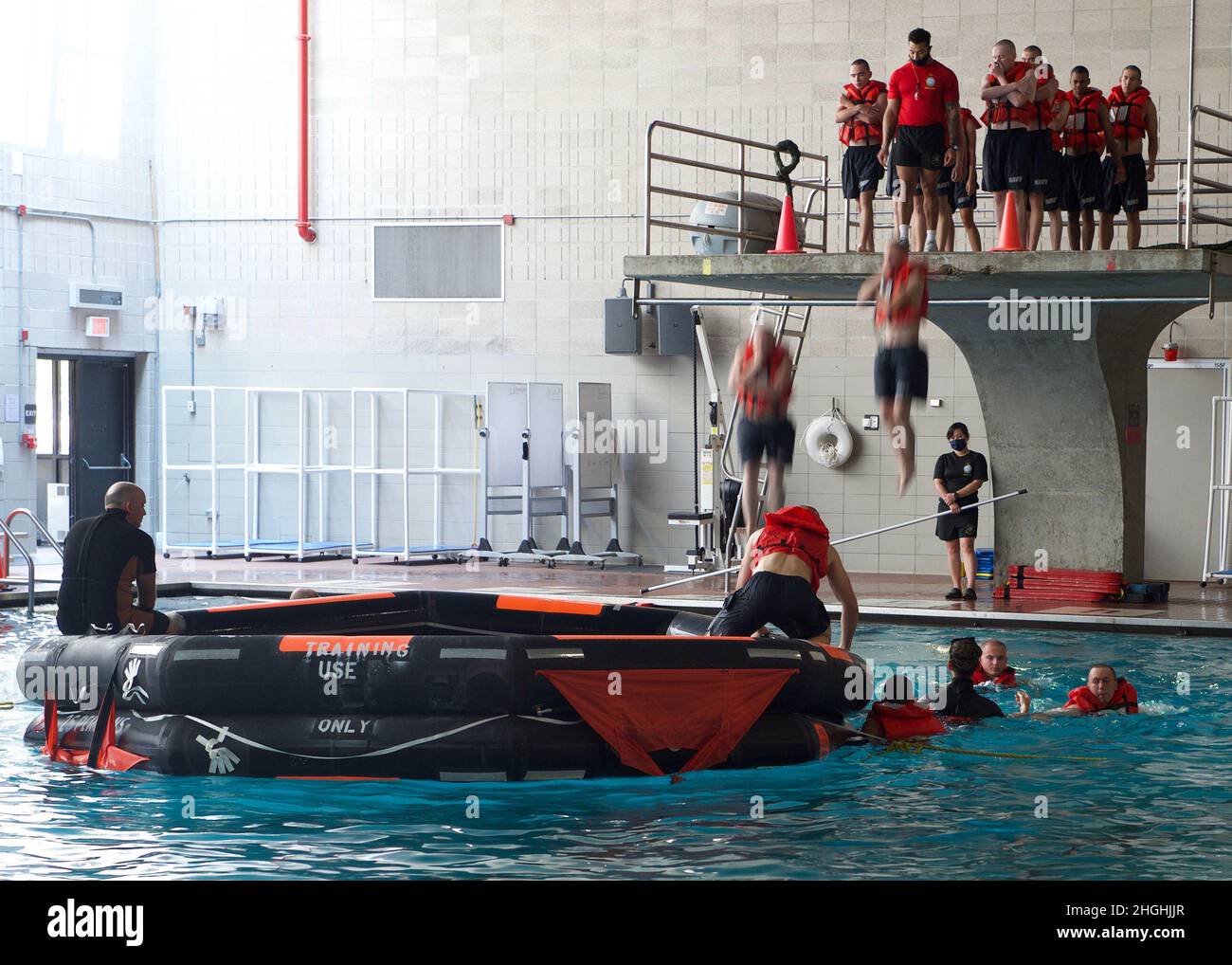 Recruits participate in an abandon ship exercise in the USS ...