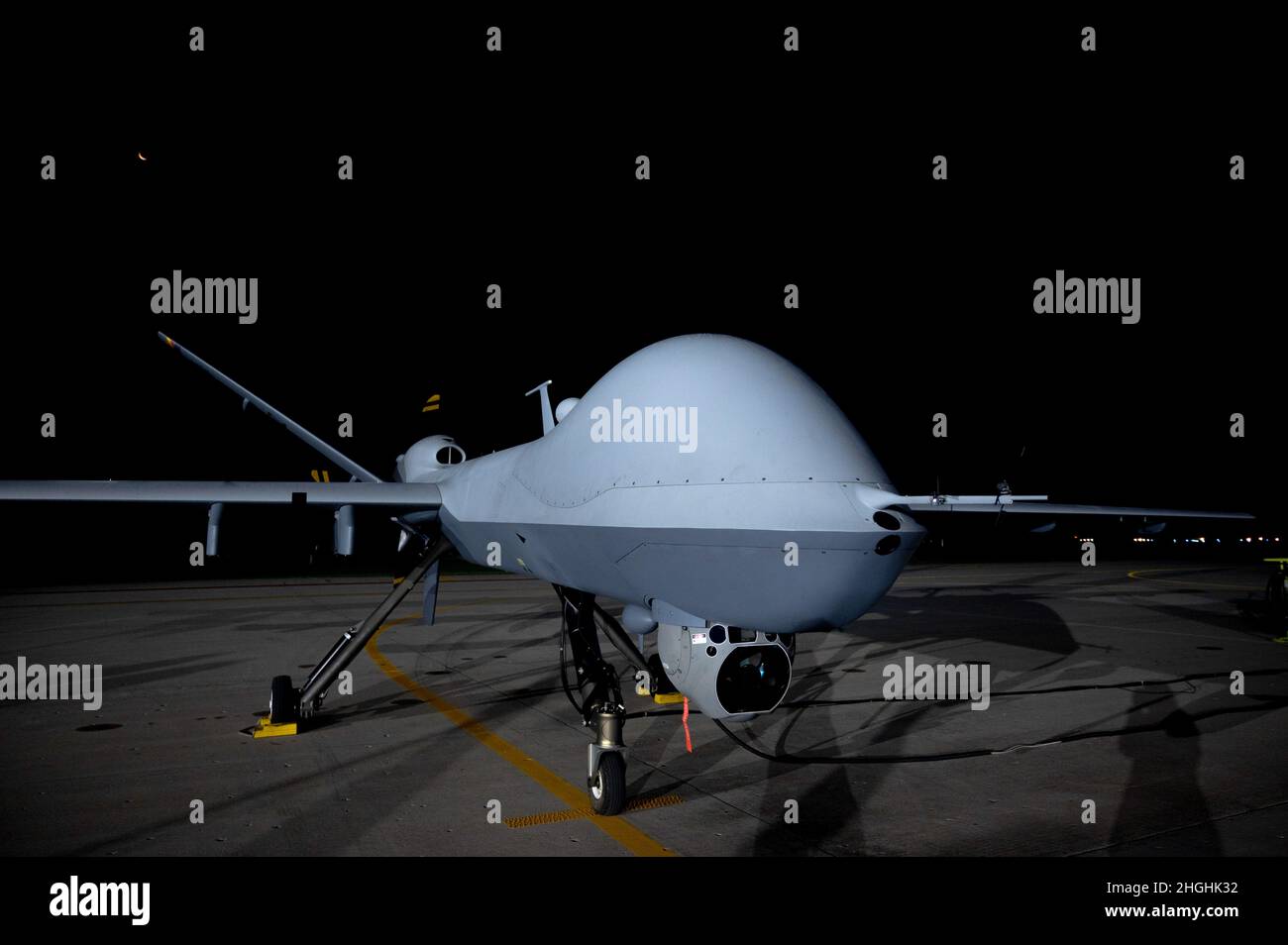 An MQ-9 Reaper sits on the flightline before a launch during Northern ...