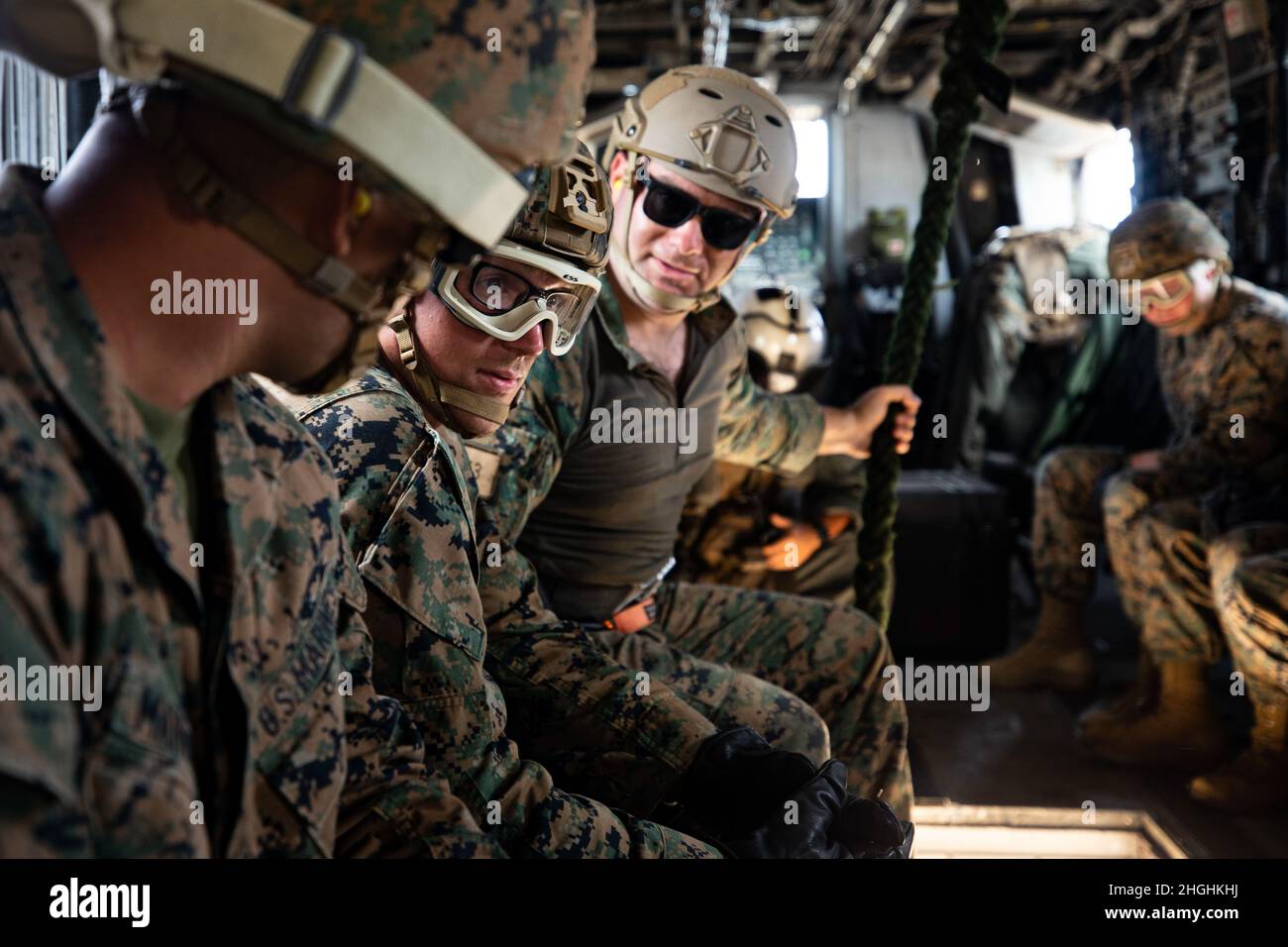 U.S. Marines with 3rd Radio Battalion prepare to conduct helicopter ...