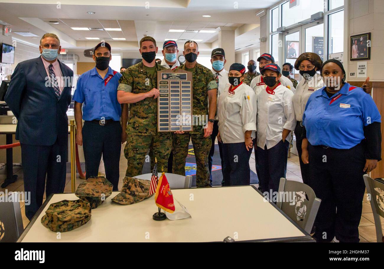 Dwyer Hall employees and Marines pose for a photo during the Mess Hall ...