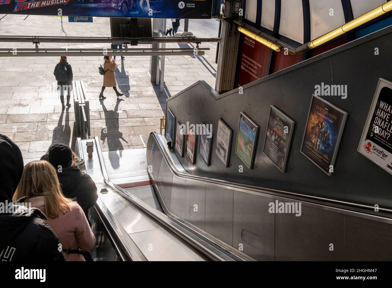 Commuting passengers who have just arrived in the City of London, the ...