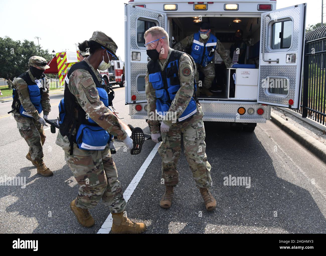 Members of the 81st Medical Group prepare to load a "victim" in the ...