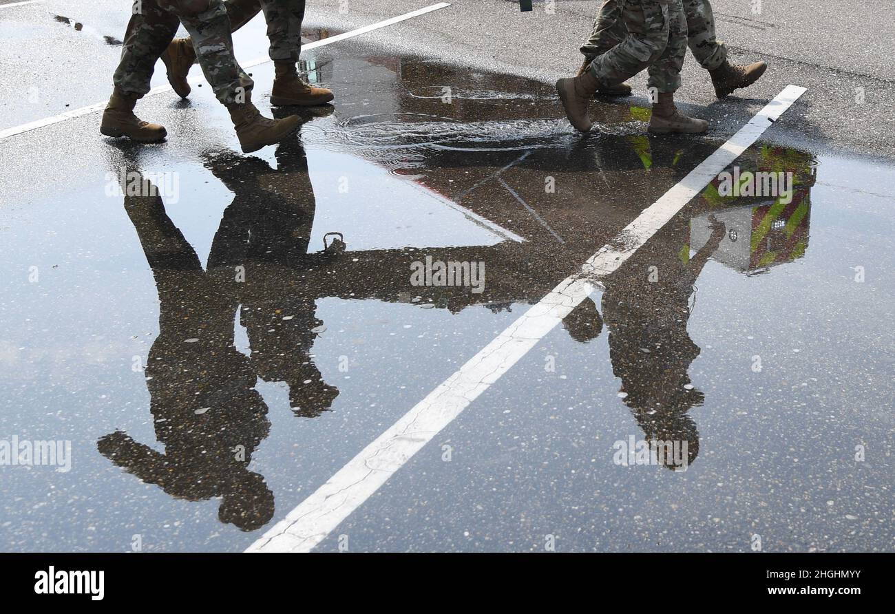 Members of the 81st Medical Group carries a "victim" to an ambulance ...