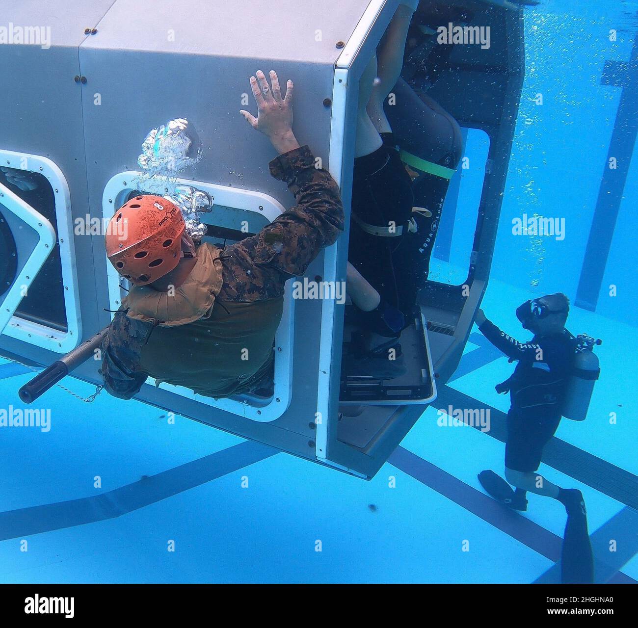 U.S. Marines with 3d Reconnaissance Battalion, 3d Marine Division, exit ...