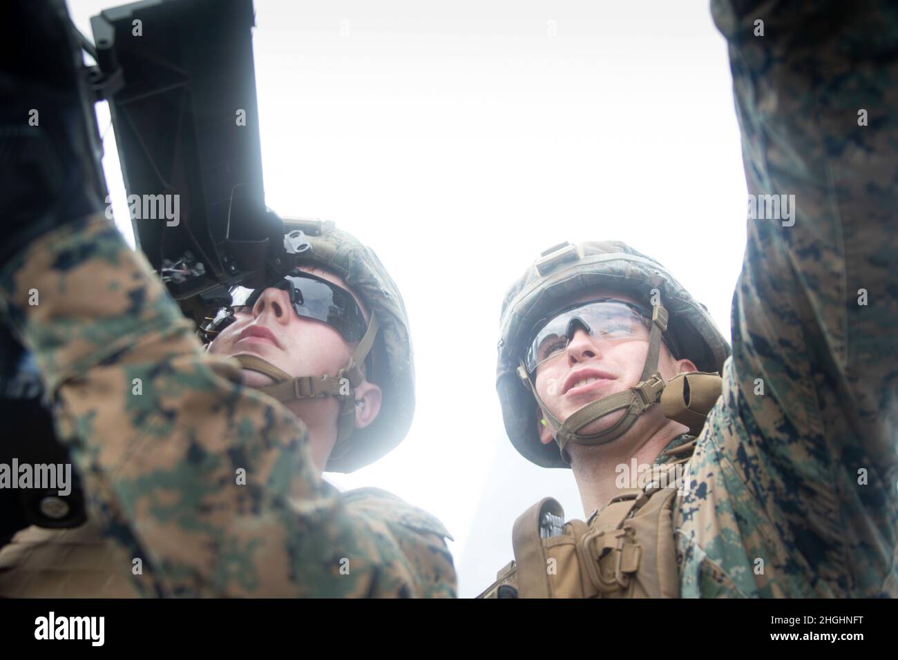 U.S. Marine Corps Lance Cpl. Domonic Mundy and Cpl. Luis Torres, low ...