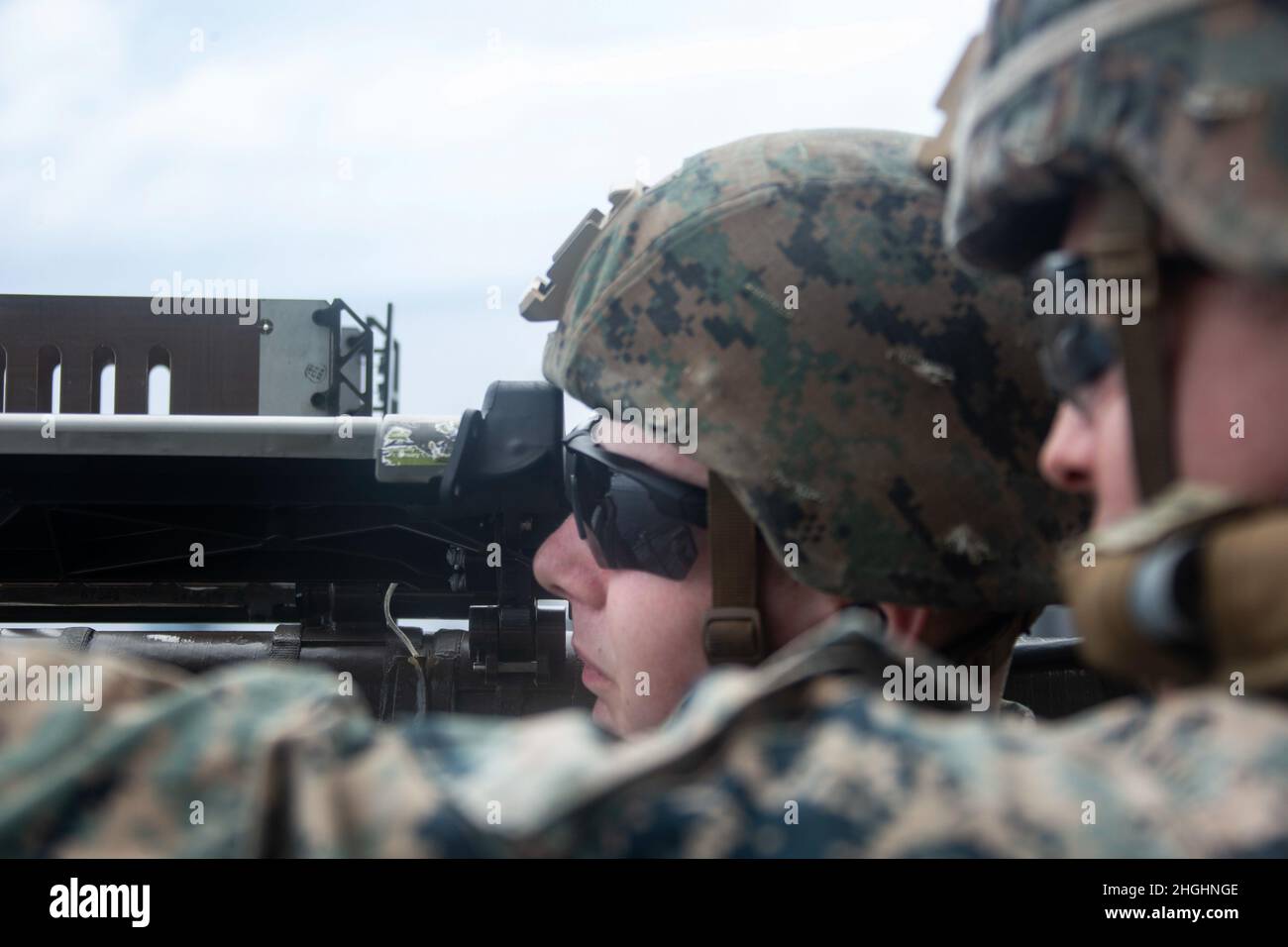 U.S. Marine Corps Lance Cpl. Domonic Mundy and Cpl. Luis Torres, low ...