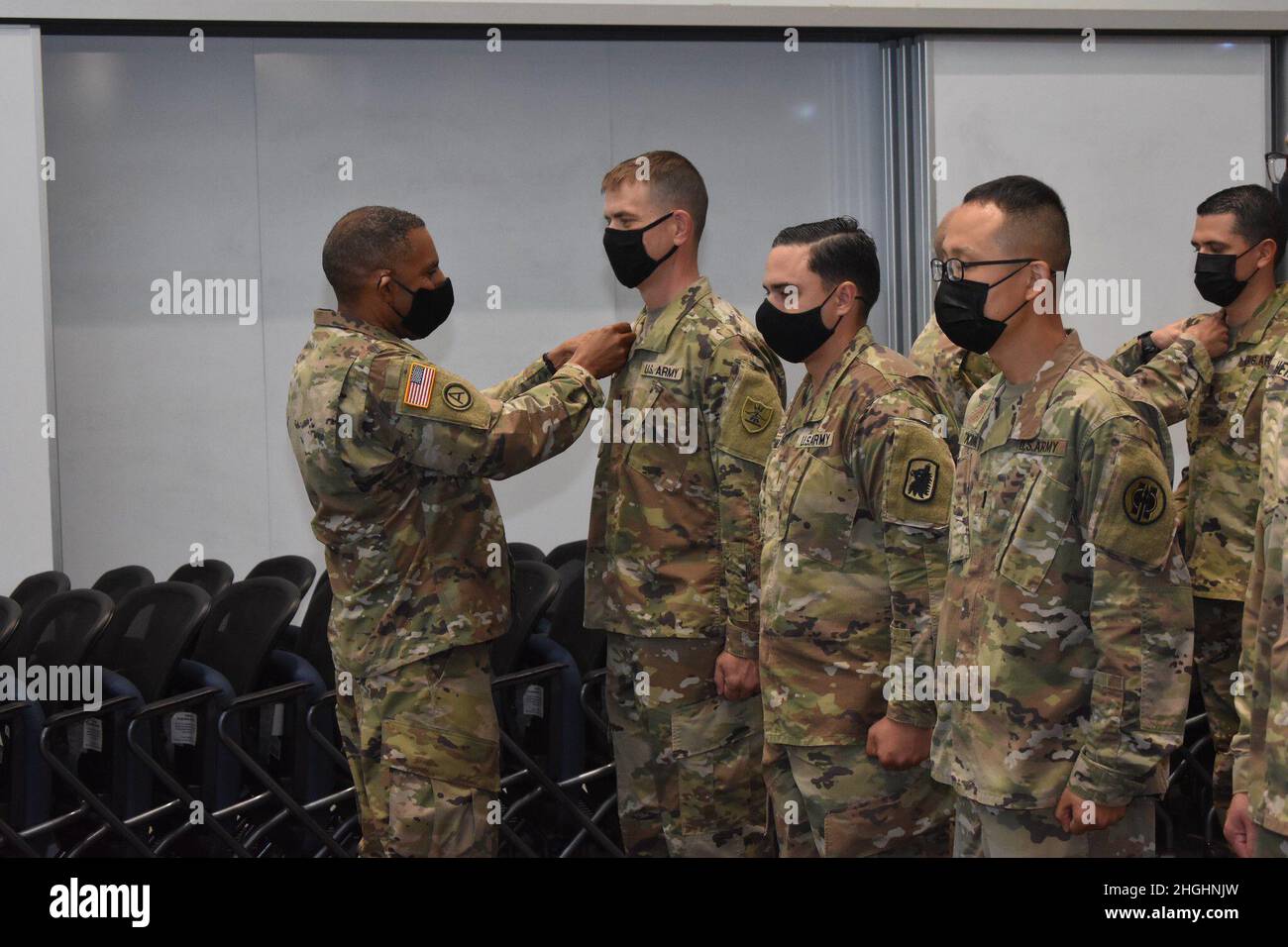 Chaplain School Commandant, Chap. (Col.) James Palmer, Jr. pins a ...