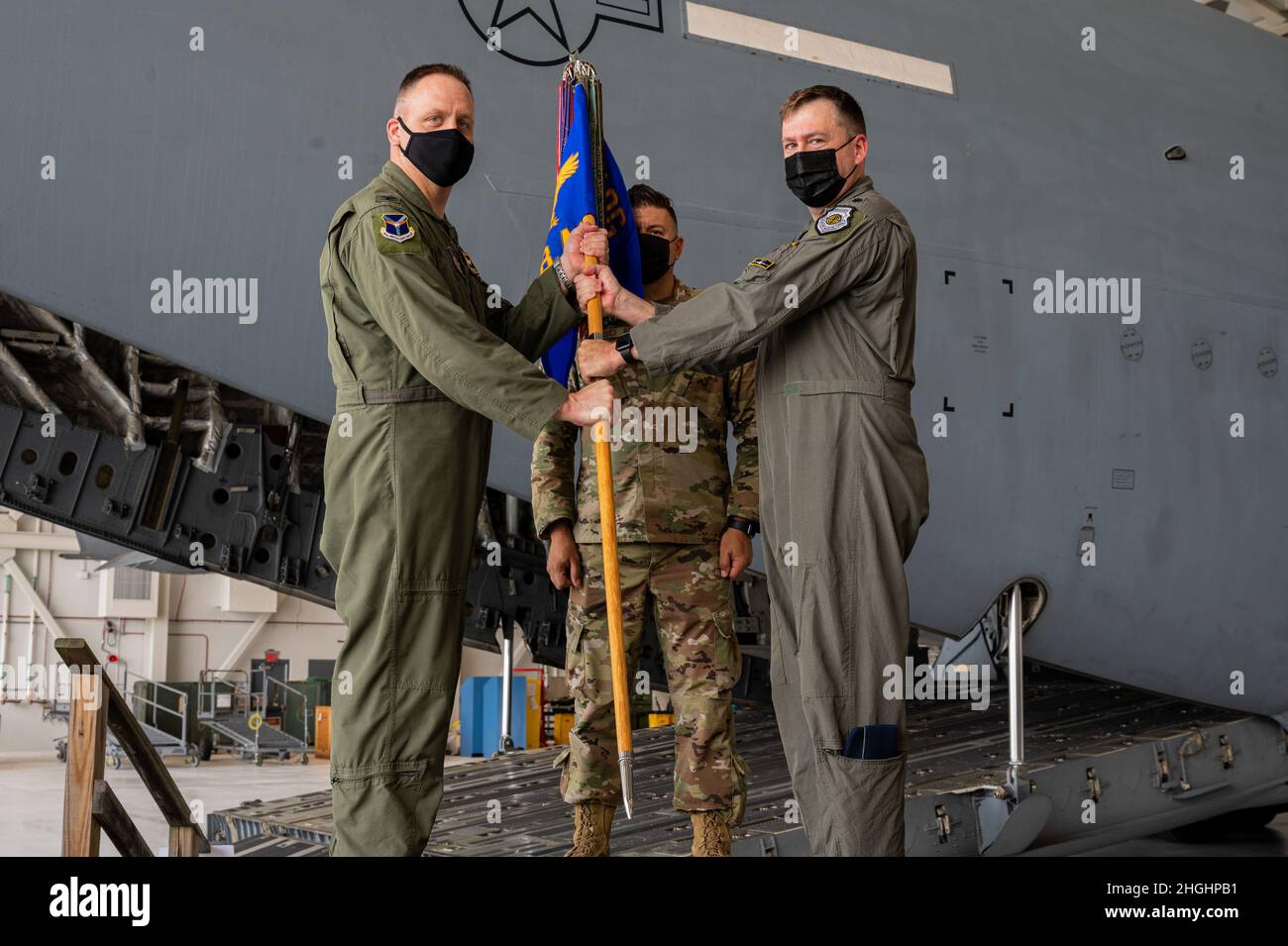 Col. Bryan Bailey, 911th Operations Group commander, receives the ...