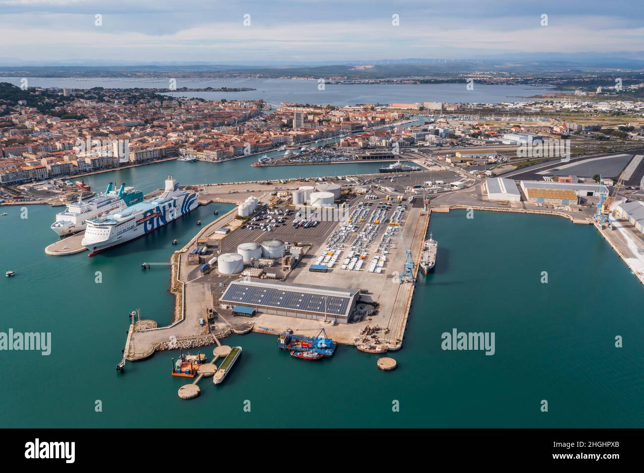 Aerial panorama of the commercial port of Sete at sunset in Herault in ...
