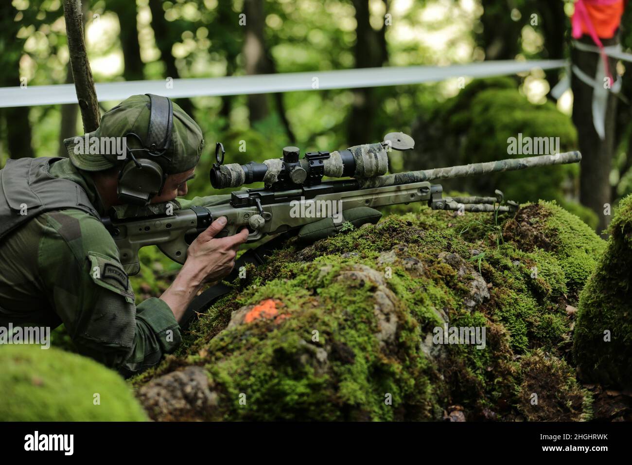 A Sniper from Sweden aims down range during European Best Sniper Team ...