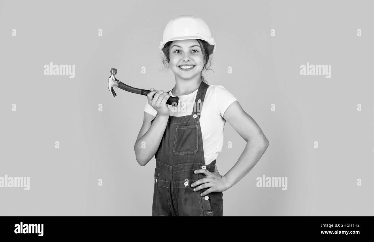 happy kid engineer with hammer tool in hard hat, manager Stock Photo ...