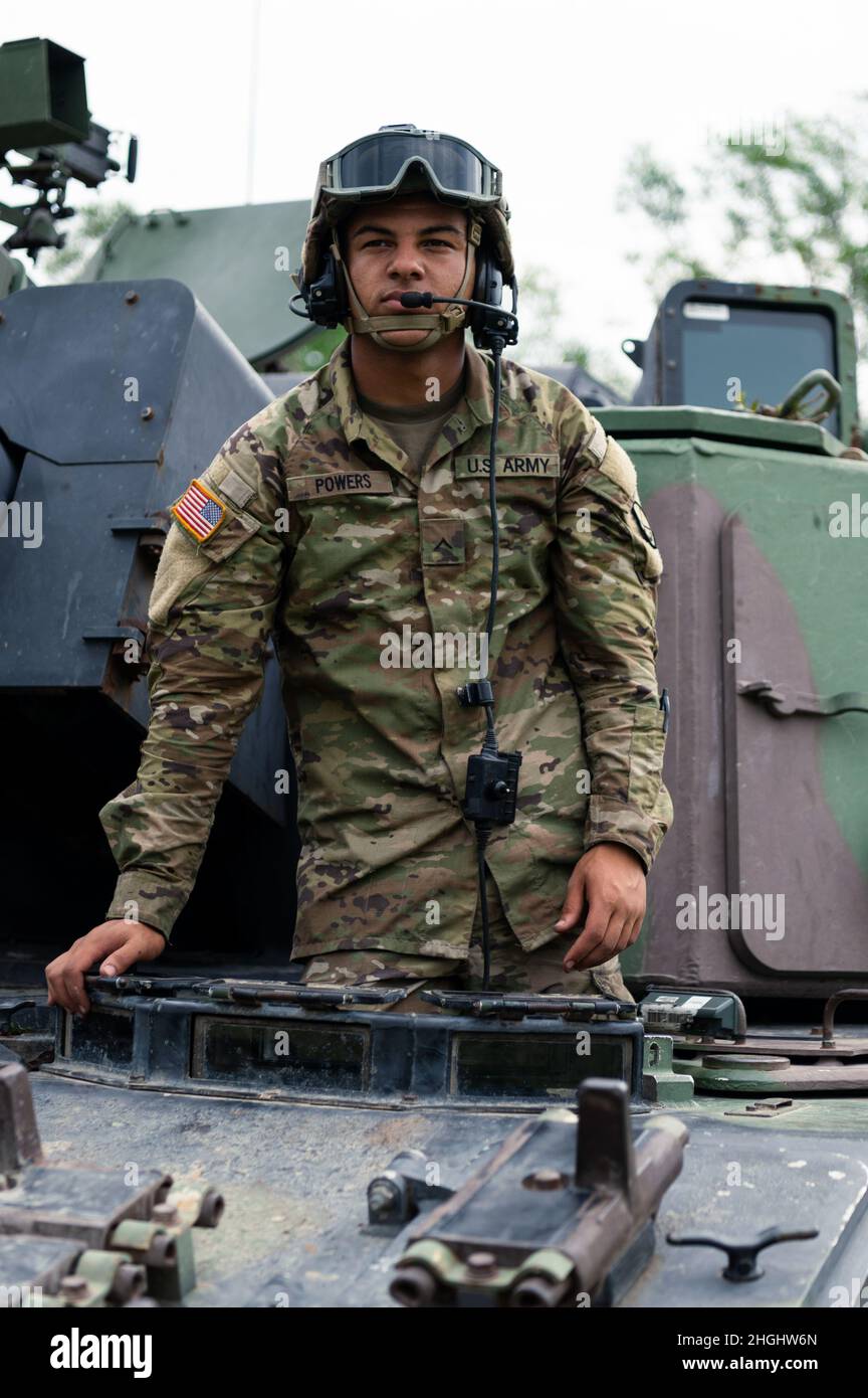 U.S. Army Private Isaiah Powers, a cannon crew cannoneer, from the 1st ...