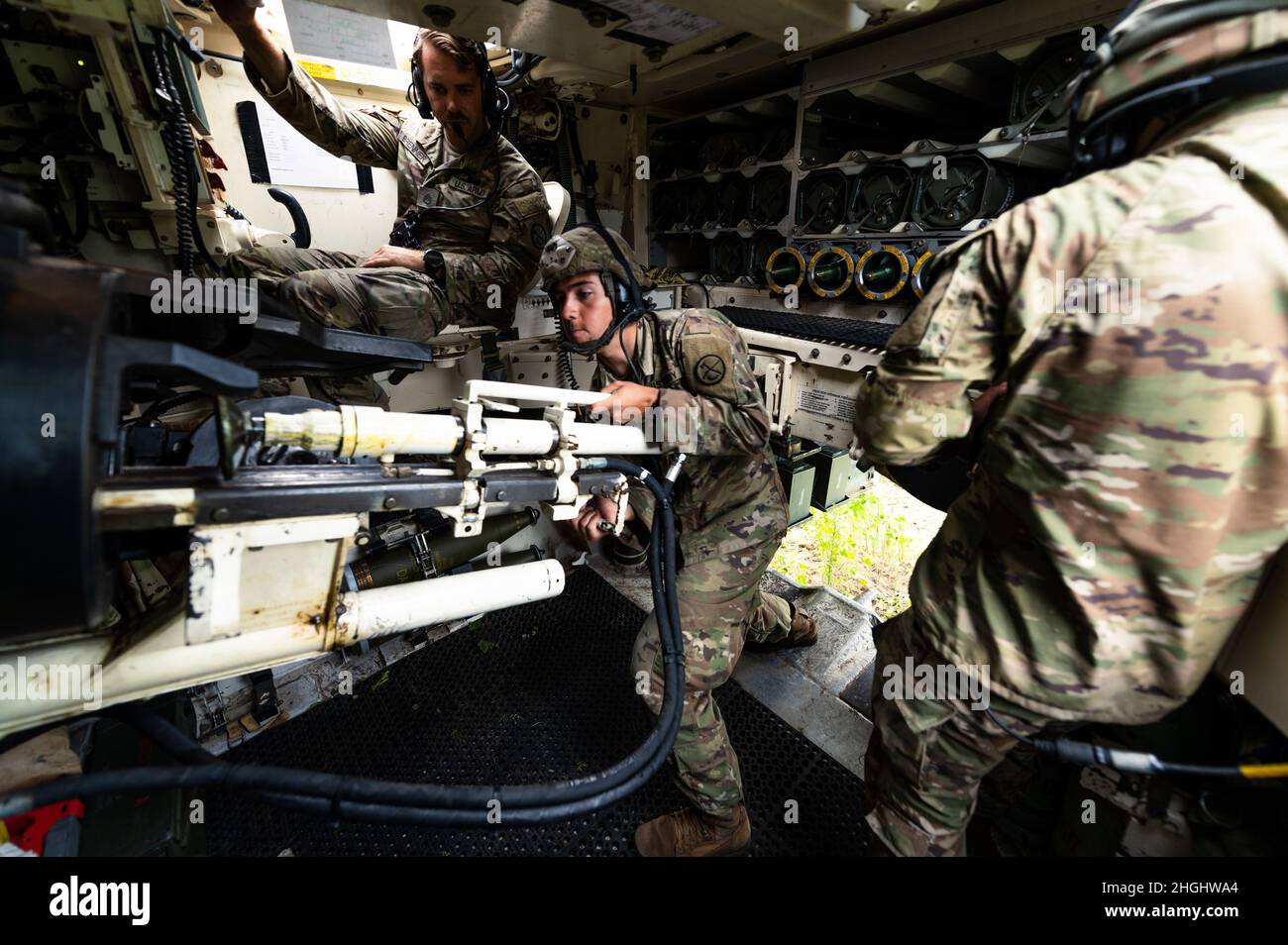 U.S. Army cannon crew members Staff Sgt. Adam Brenner, a Howitzer ...
