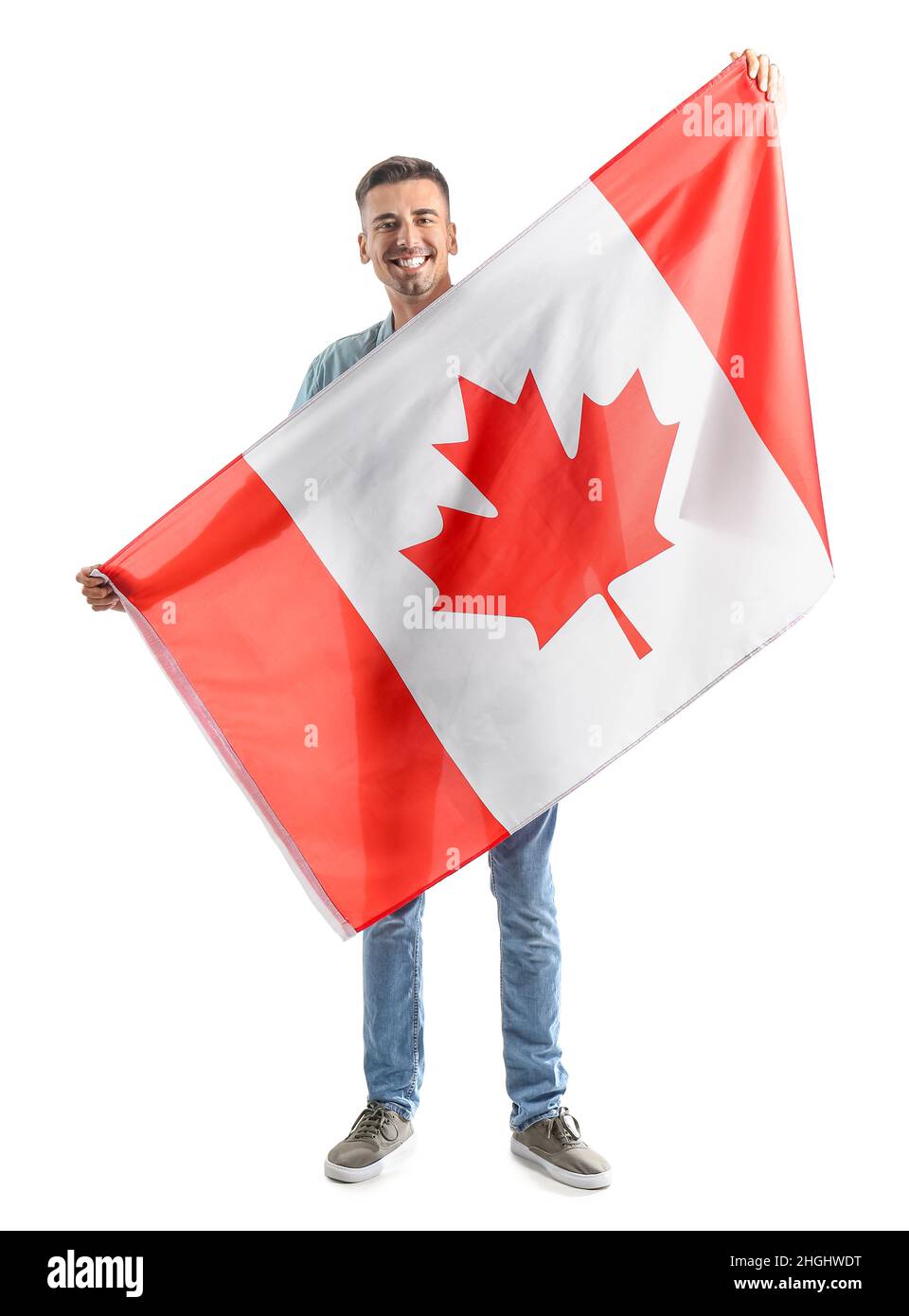 Young man with Canadian flag isolated on white Stock Photo - Alamy
