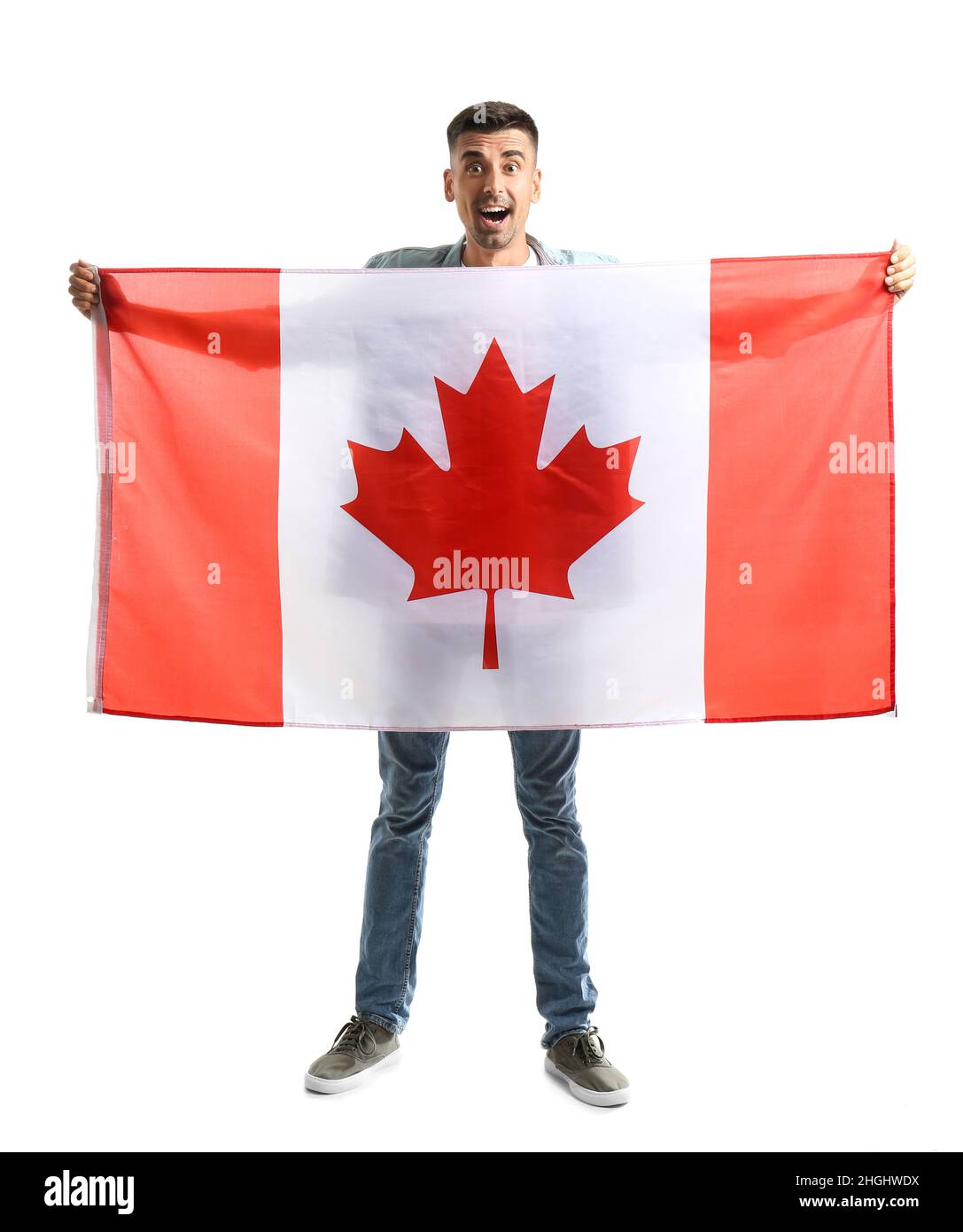 Happy young man with Canadian flag isolated on white Stock Photo - Alamy