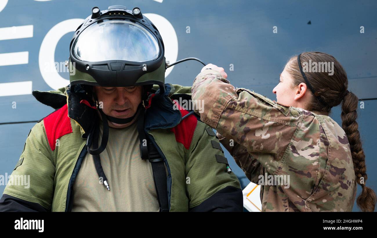 Col. Mark Dmytryszyn, 2nd Bomb Wing commander, puts on a bomb suit with ...
