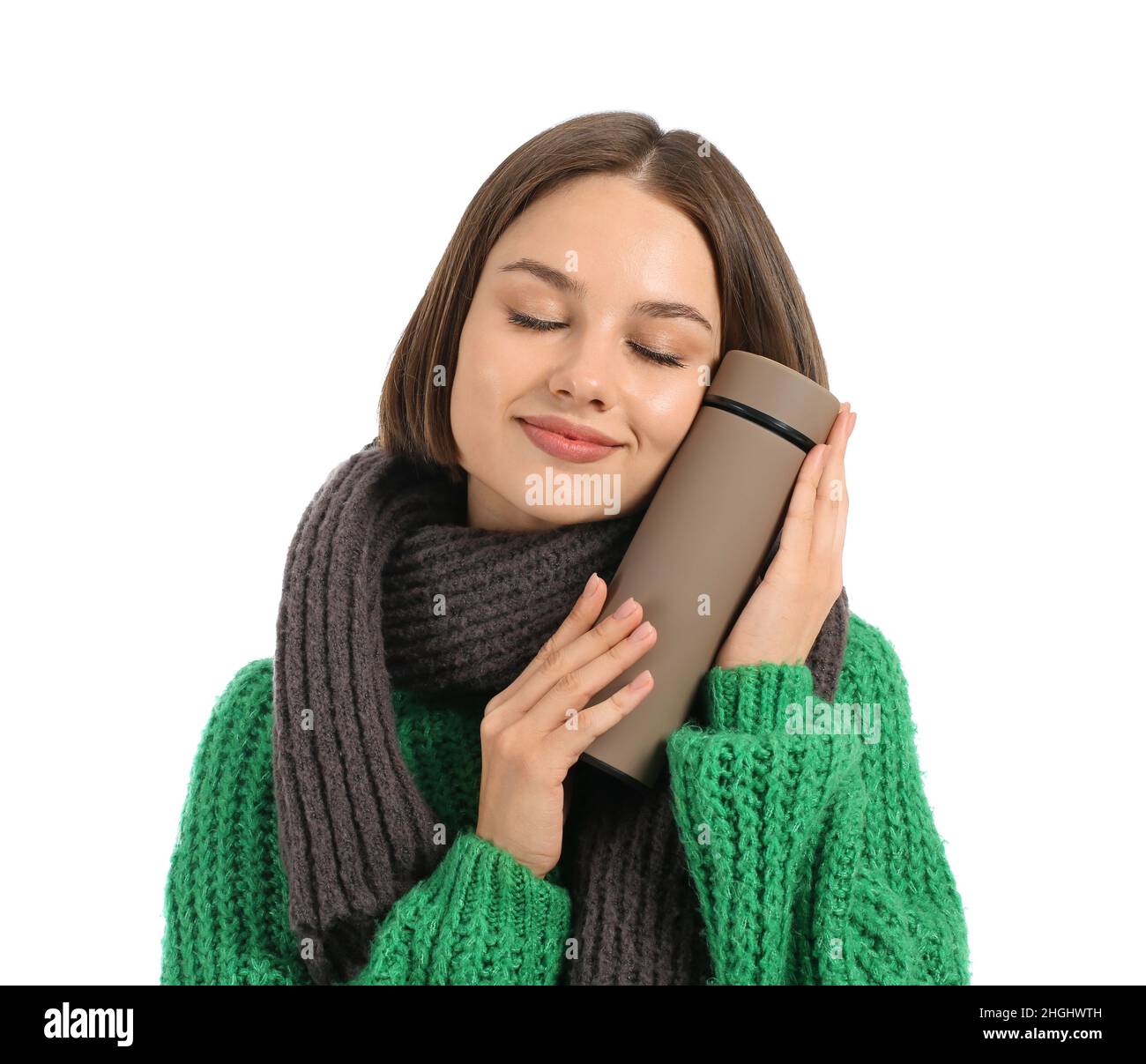 Beautiful young woman with thermos isolated on white Stock Photo - Alamy