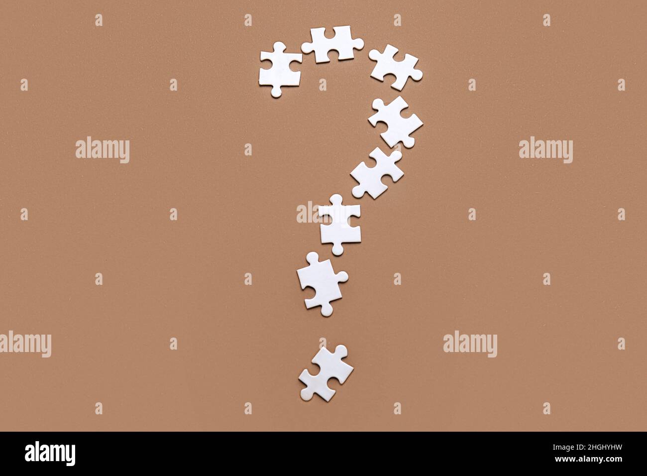 Question mark made of puzzles on color background Stock Photo - Alamy