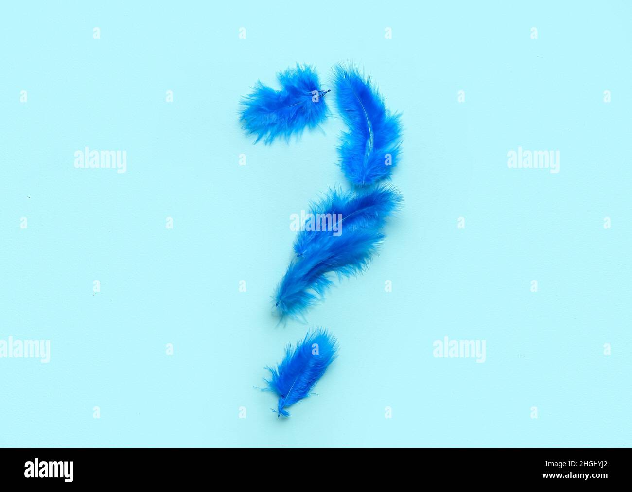 Question mark made of made of feathers on color background Stock Photo ...