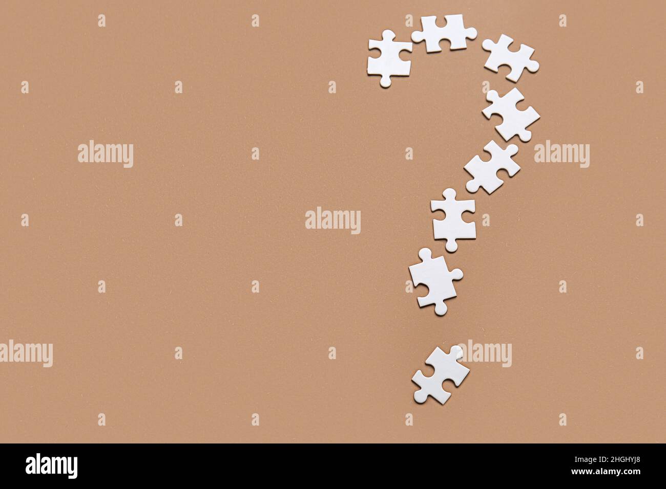 Question mark made of puzzles on color background Stock Photo - Alamy