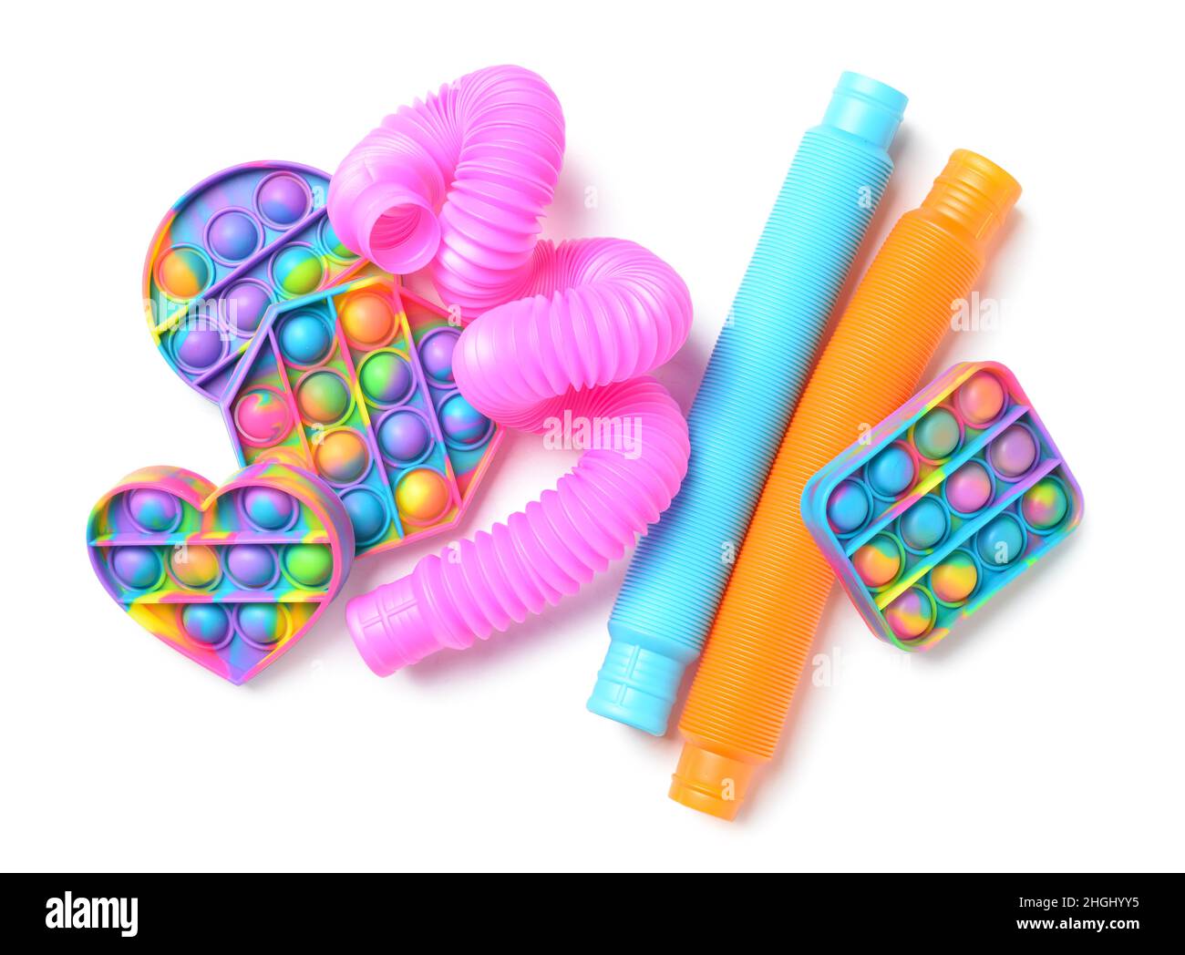 Colorful Pop Tubes and Pop it fidget toys on white background Stock ...