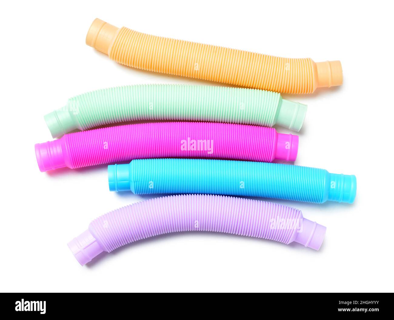 Different colorful Pop Tubes on white background Stock Photo - Alamy