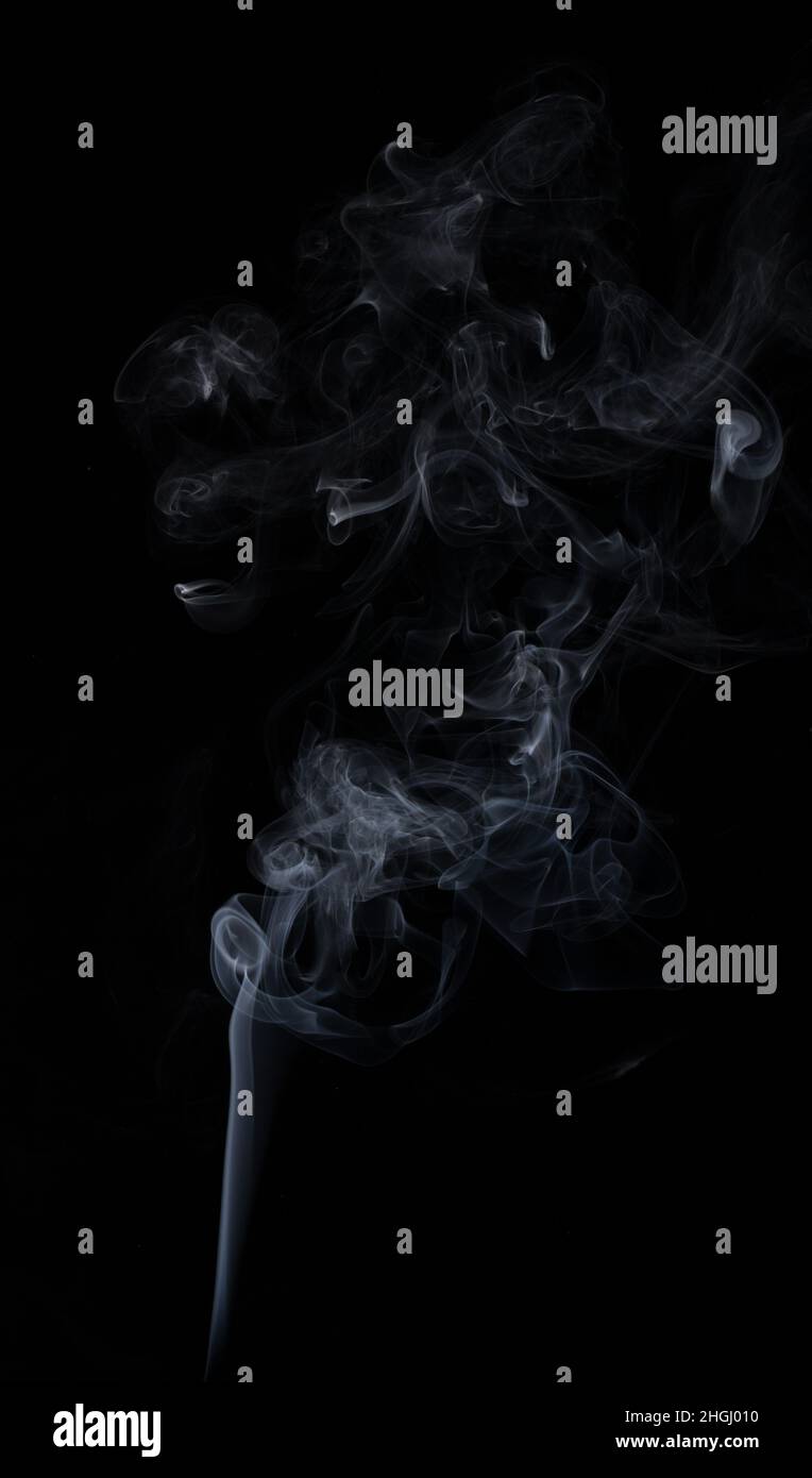 Movement of white smoke isolated on black background Stock Photo - Alamy