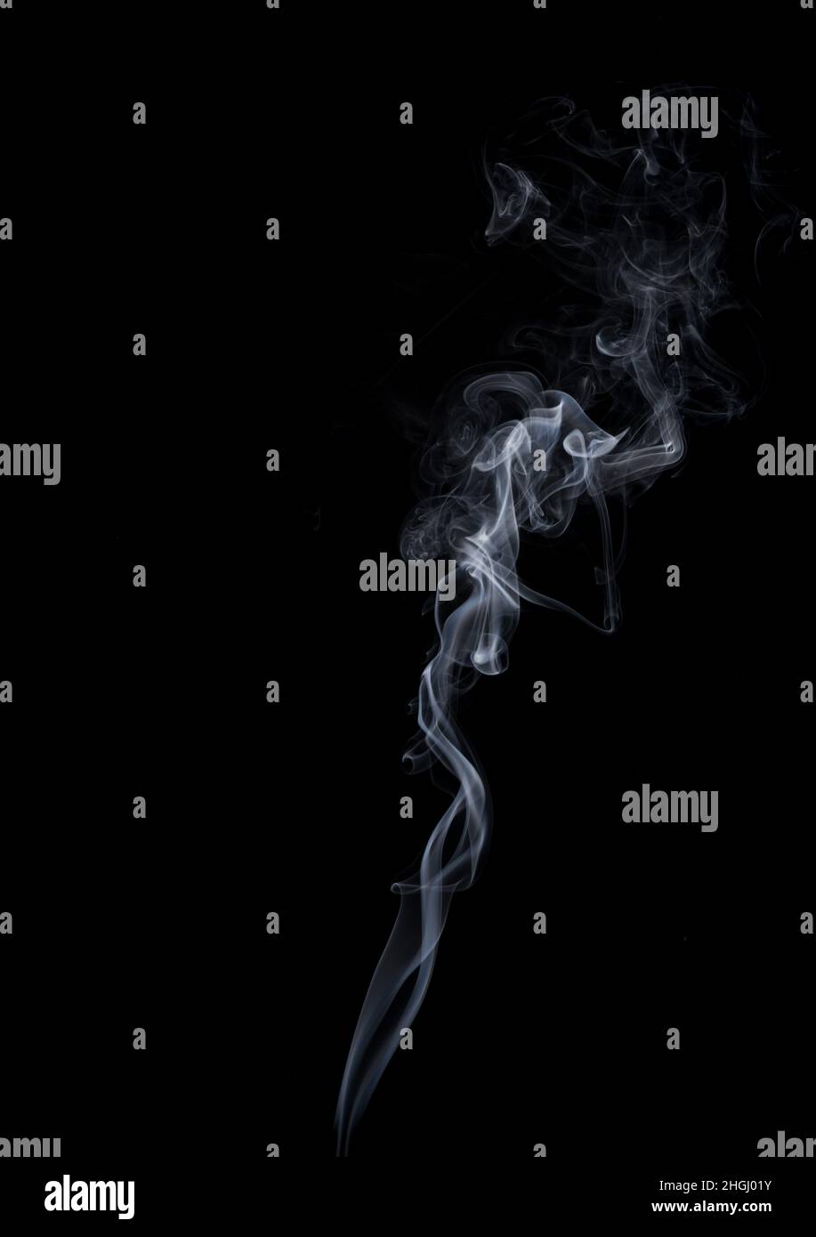 Movement of white smoke isolated on black background Stock Photo - Alamy