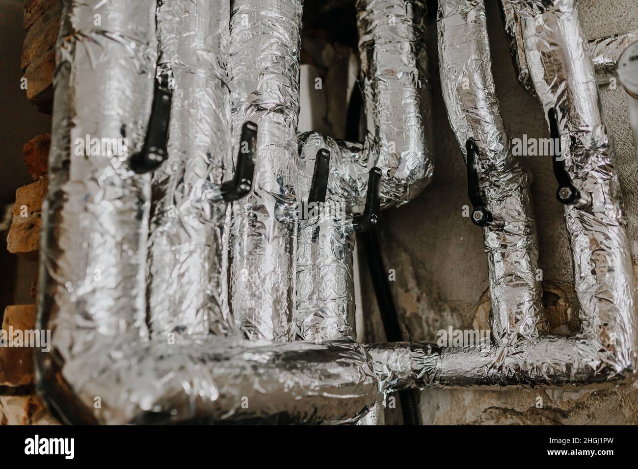 Wrapped pipes hi-res stock photography and images - Alamy