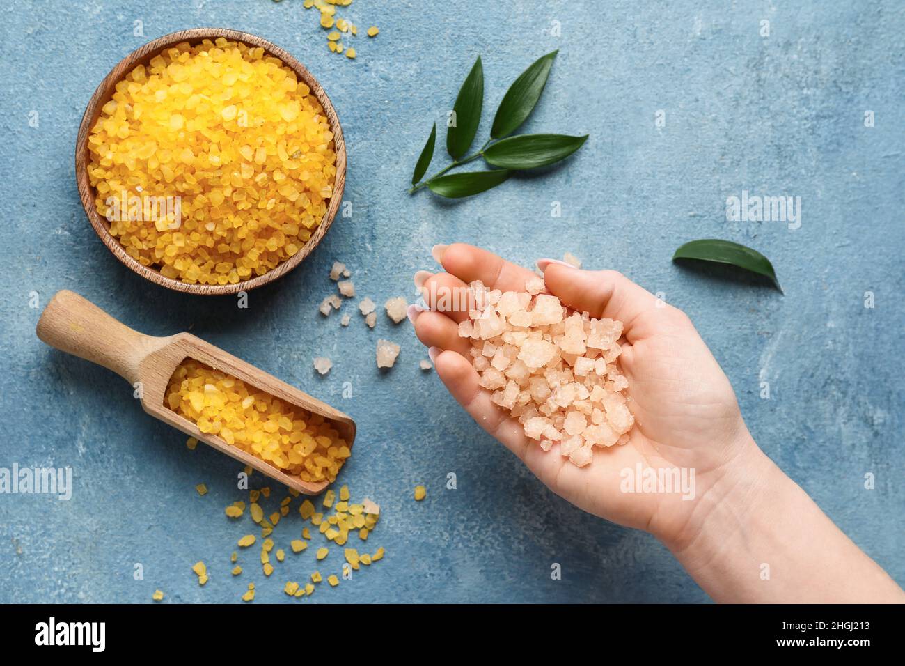 Female hand with sea salt on color background, closeup Stock Photo - Alamy