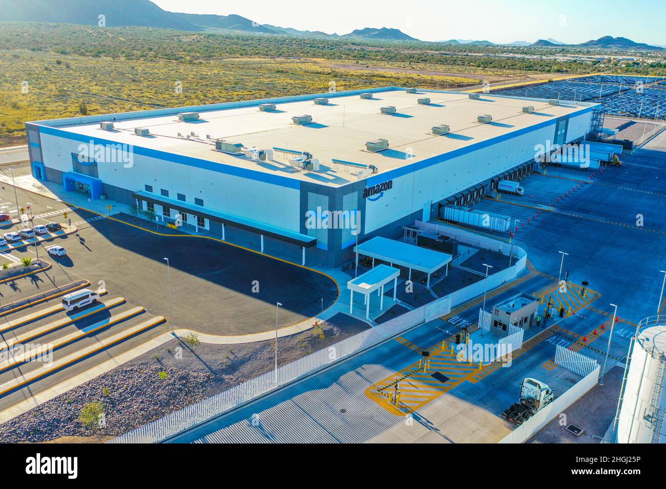 Amazon. Aerial view of Amazon warehouse or parcel distribution center ...