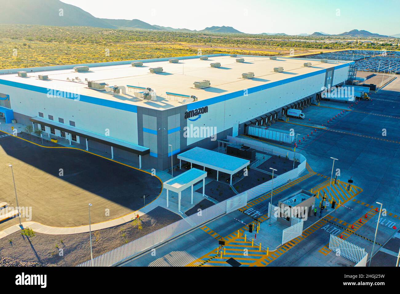 Amazon. Aerial view of Amazon warehouse or parcel distribution center ...