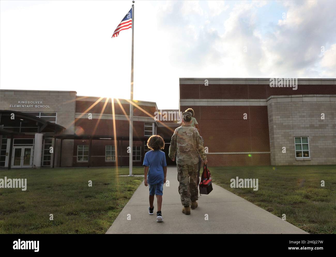 A Soldier walks her child into Kingsolver Elementary the first week of ...