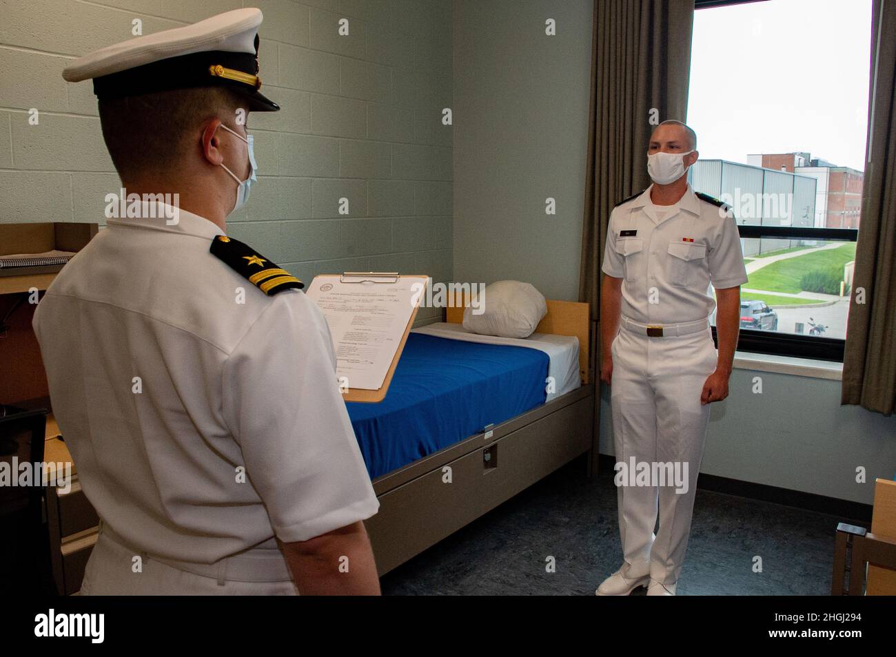 An Officer Candidate School (OCS) class 17-21 student (right), at ...