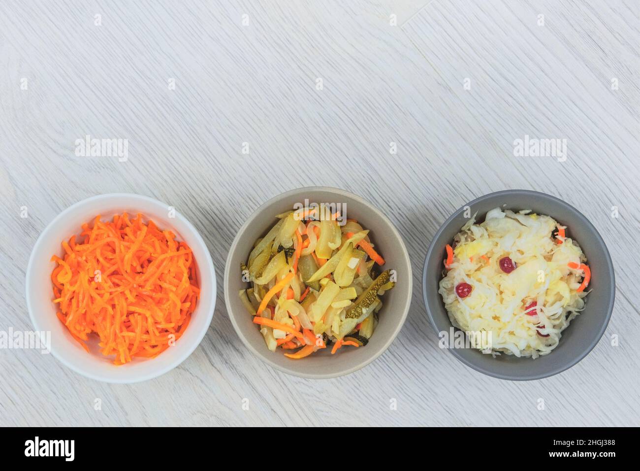 Fermented preserved vegetarian food concept. Pickled cucumbers, pickled ...