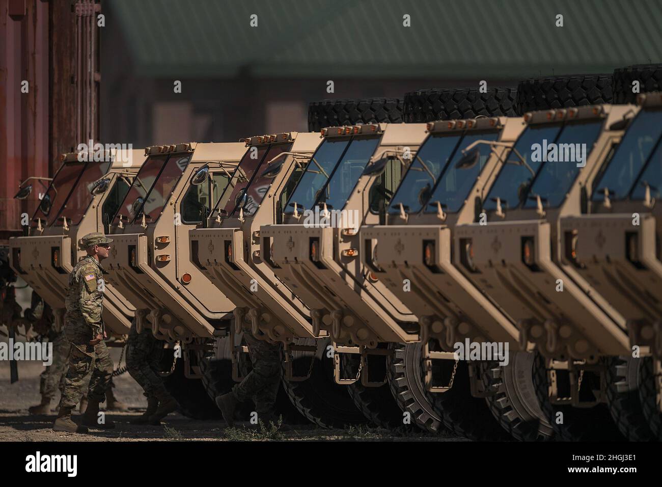 Vehicles with the 145th BSB were directed into the parking area where ...