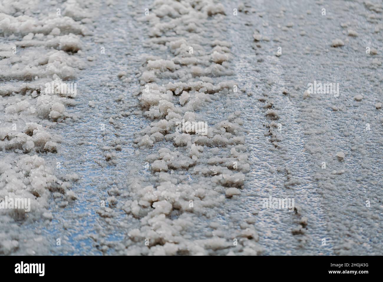 slippery street covered with slush Stock Photo - Alamy