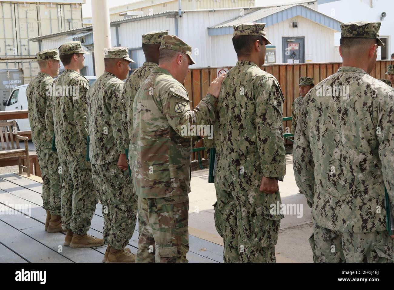 Lt. Col. Frank Tantillo, commander, Task Force Iron Gray, presents Army ...