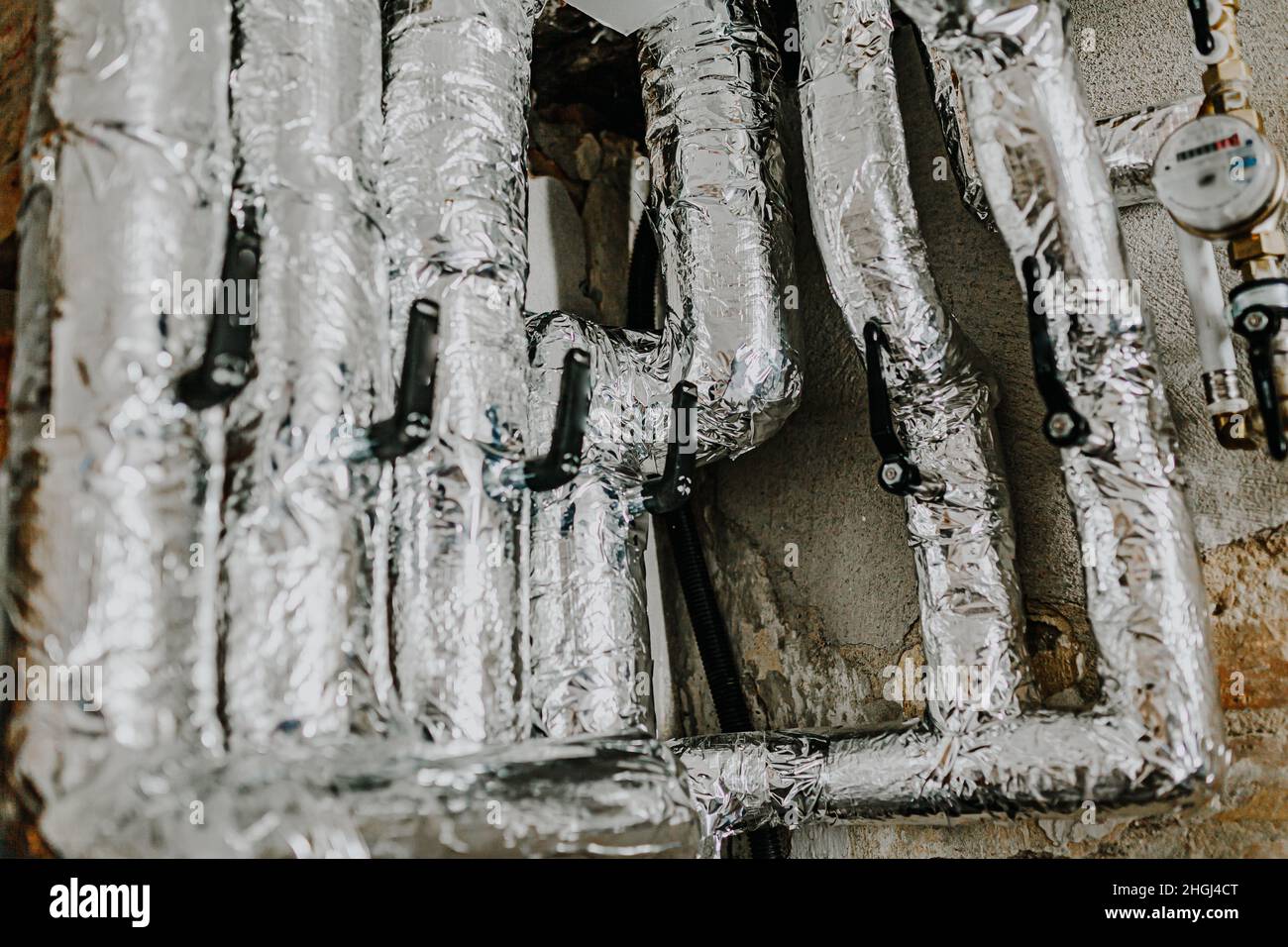 Wrapped Aluminum and Steel Pipes Close Up Stock Photo - Alamy