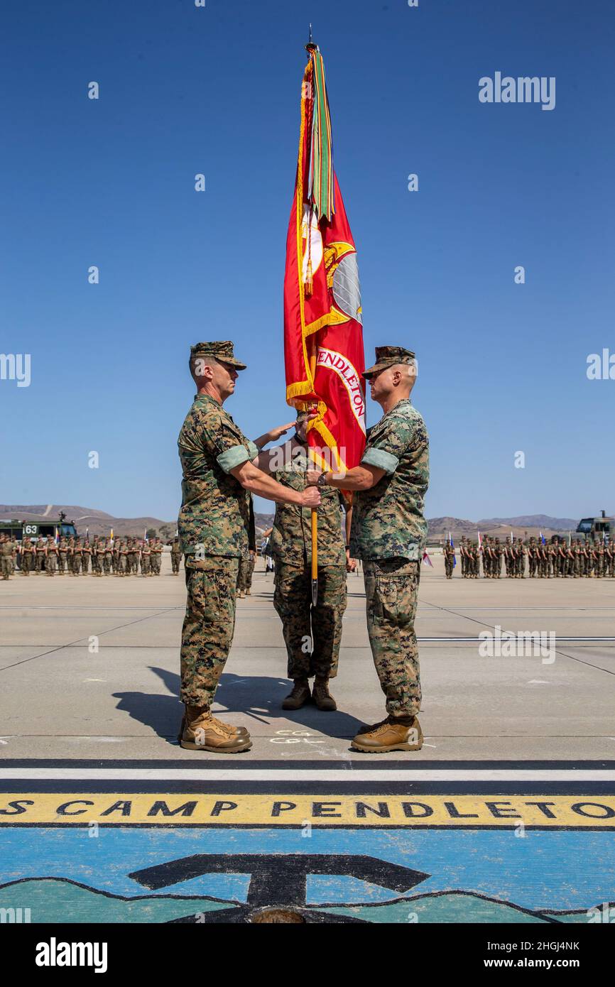 U.S. Marine Col. Richard T. Anderson, right, the outgoing commanding ...