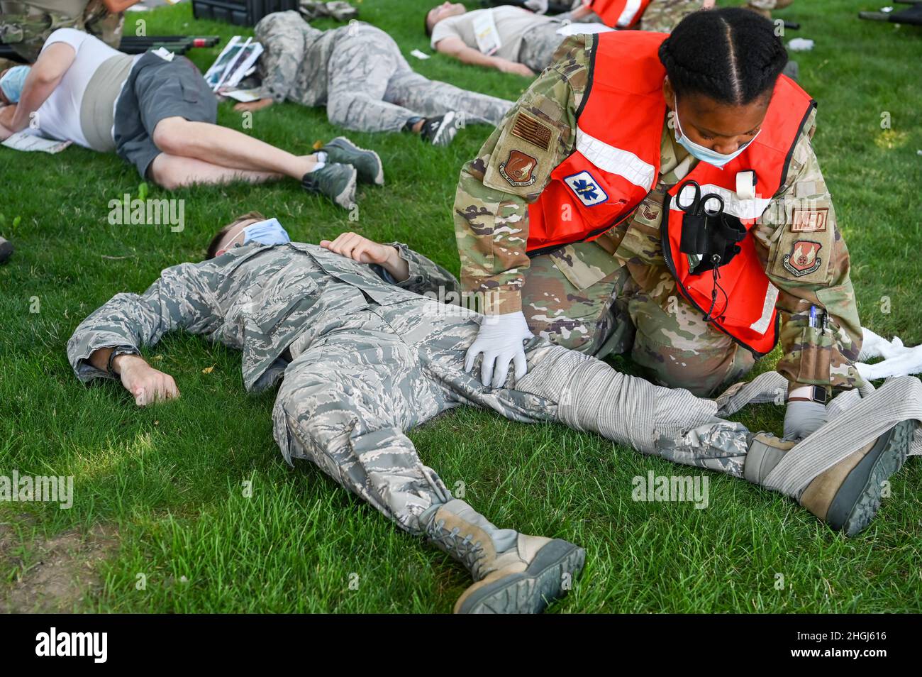 A member from 75th Medical Group triaging a simulated victim during a ...