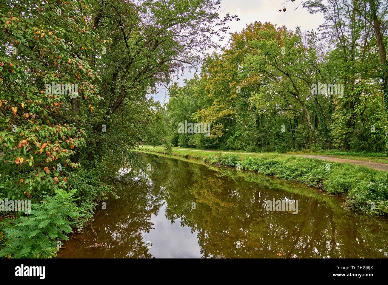 The Delaware Canal path with reflections in the canal water, along the ...