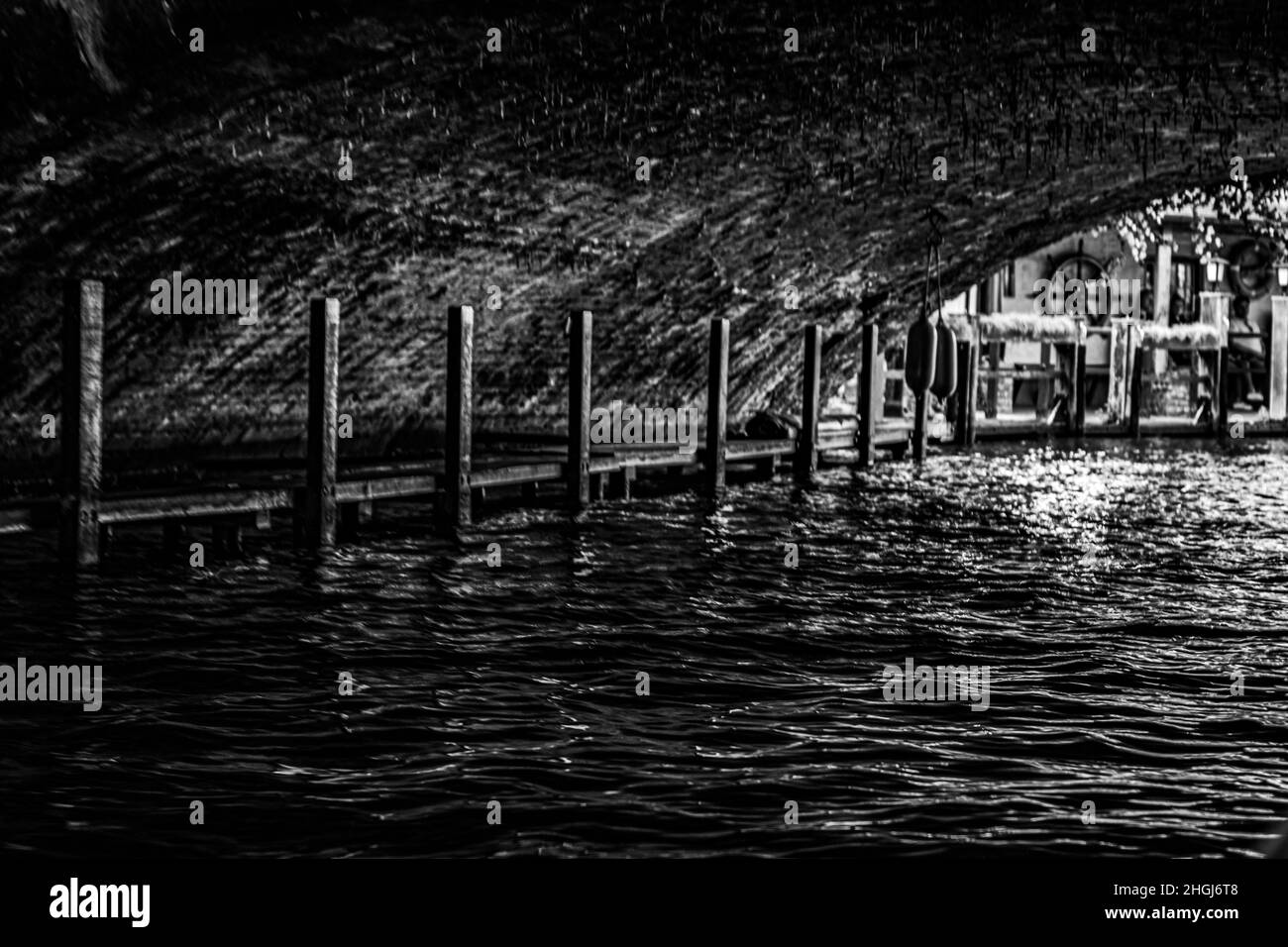 On a bot passing under a bridge Stock Photo - Alamy