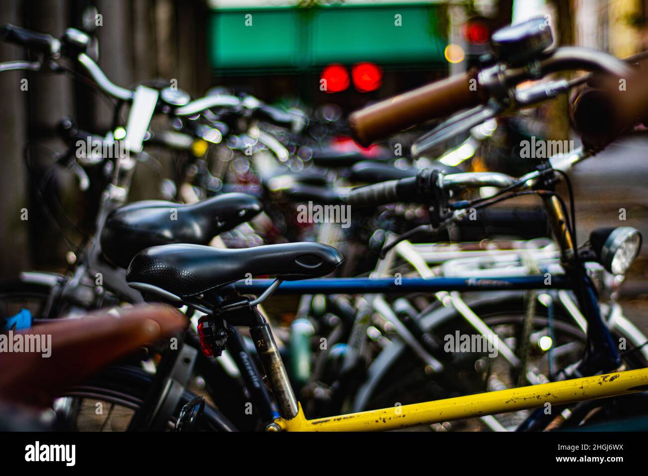 Multiple Bicycles locked on a rack Stock Photo - Alamy