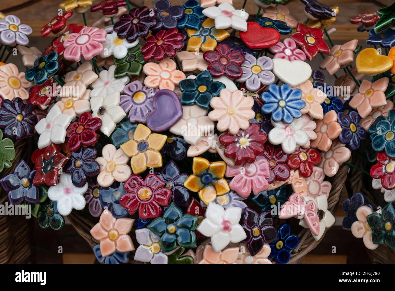Beautiful ceramic flowers in souvenir shop in city of Pecs Hungary ...