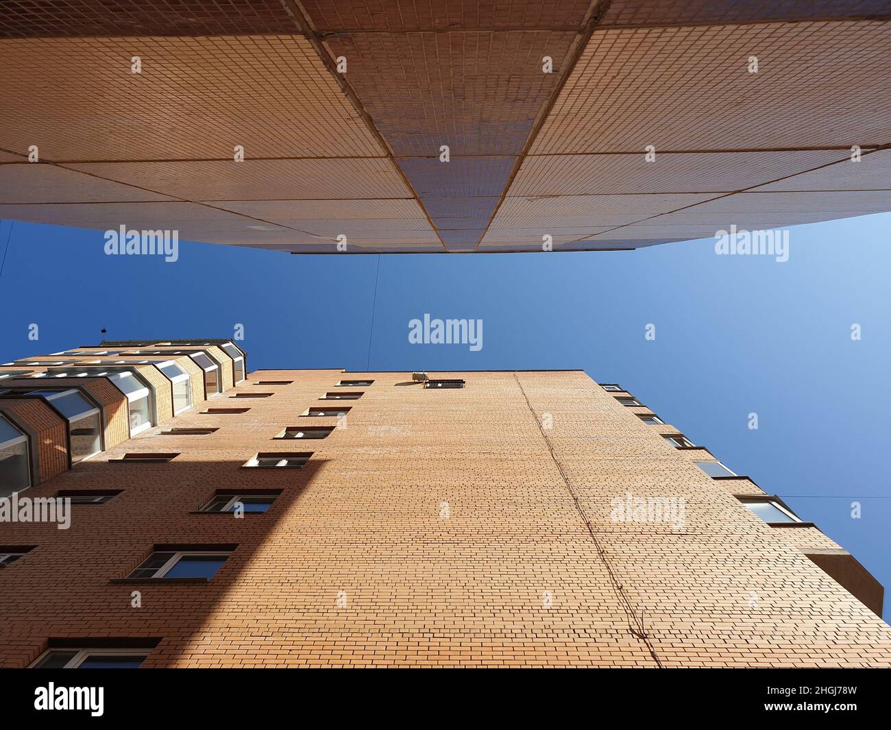 Brick high-rise buildings. Apartment building brick house Stock Photo ...