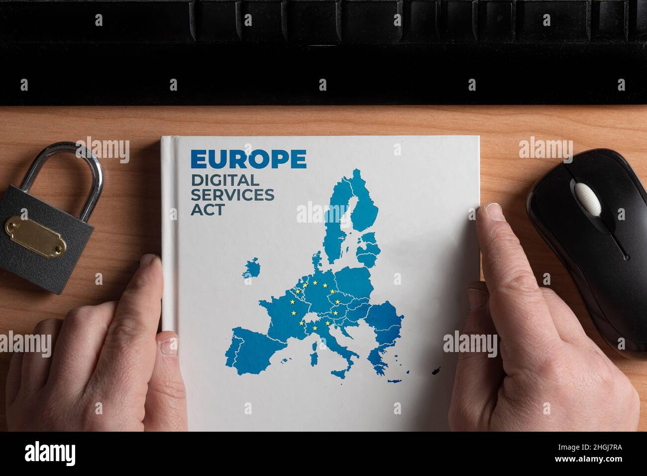 Digital services act concept: man hold a book with european union shape ...