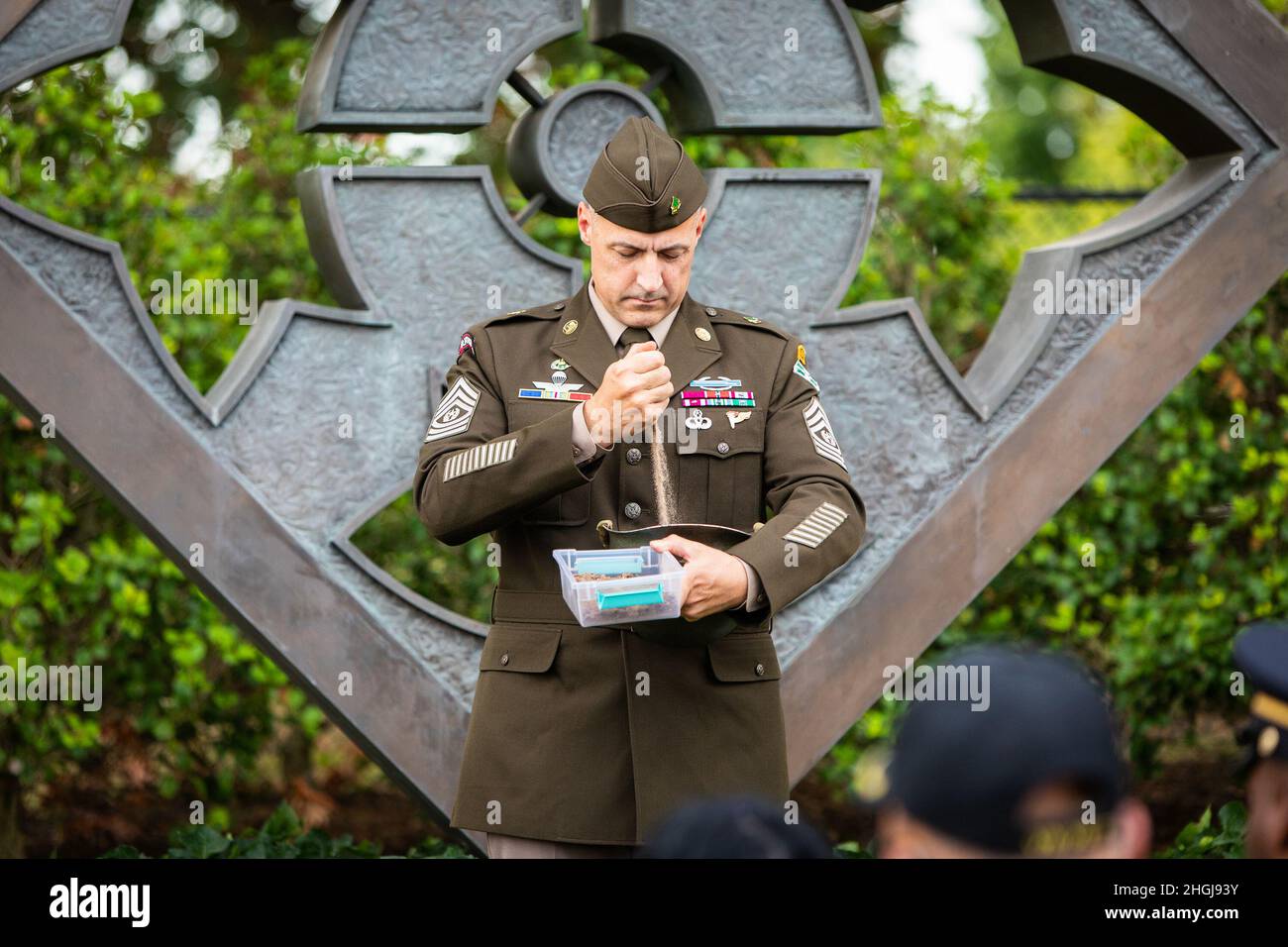 Command Sgt. Maj. Adam Nash, 4th Infantry Division command sergeant major, along with the 4th ...