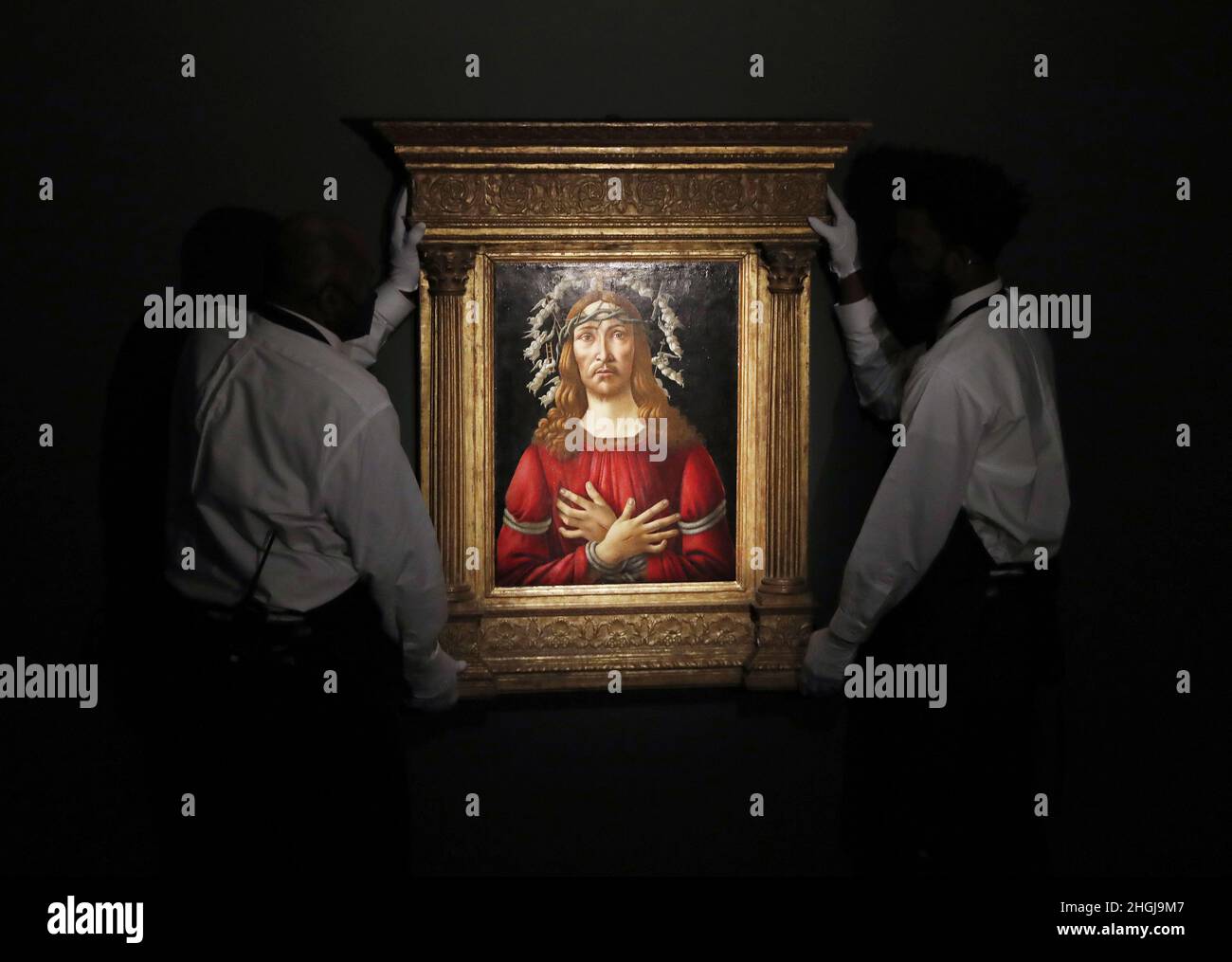 New York, USA. 21st Jan, 2022. Workers hold 'The Man of Sorrows' by ...