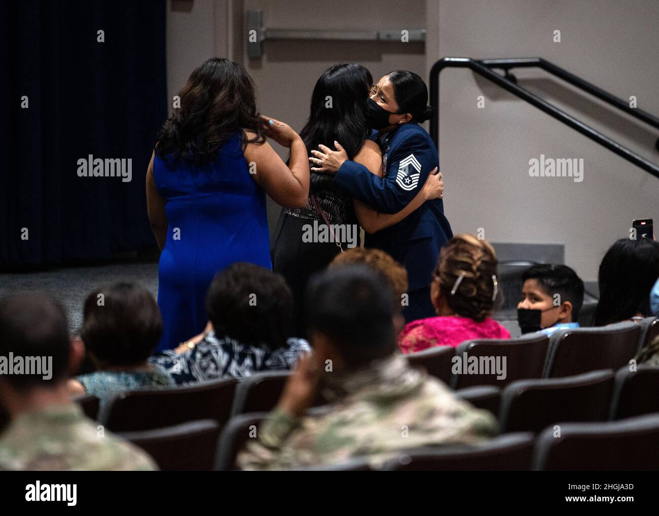 Chief Master Sergeant Michelle Echavarria Hugs her two sisters who ...